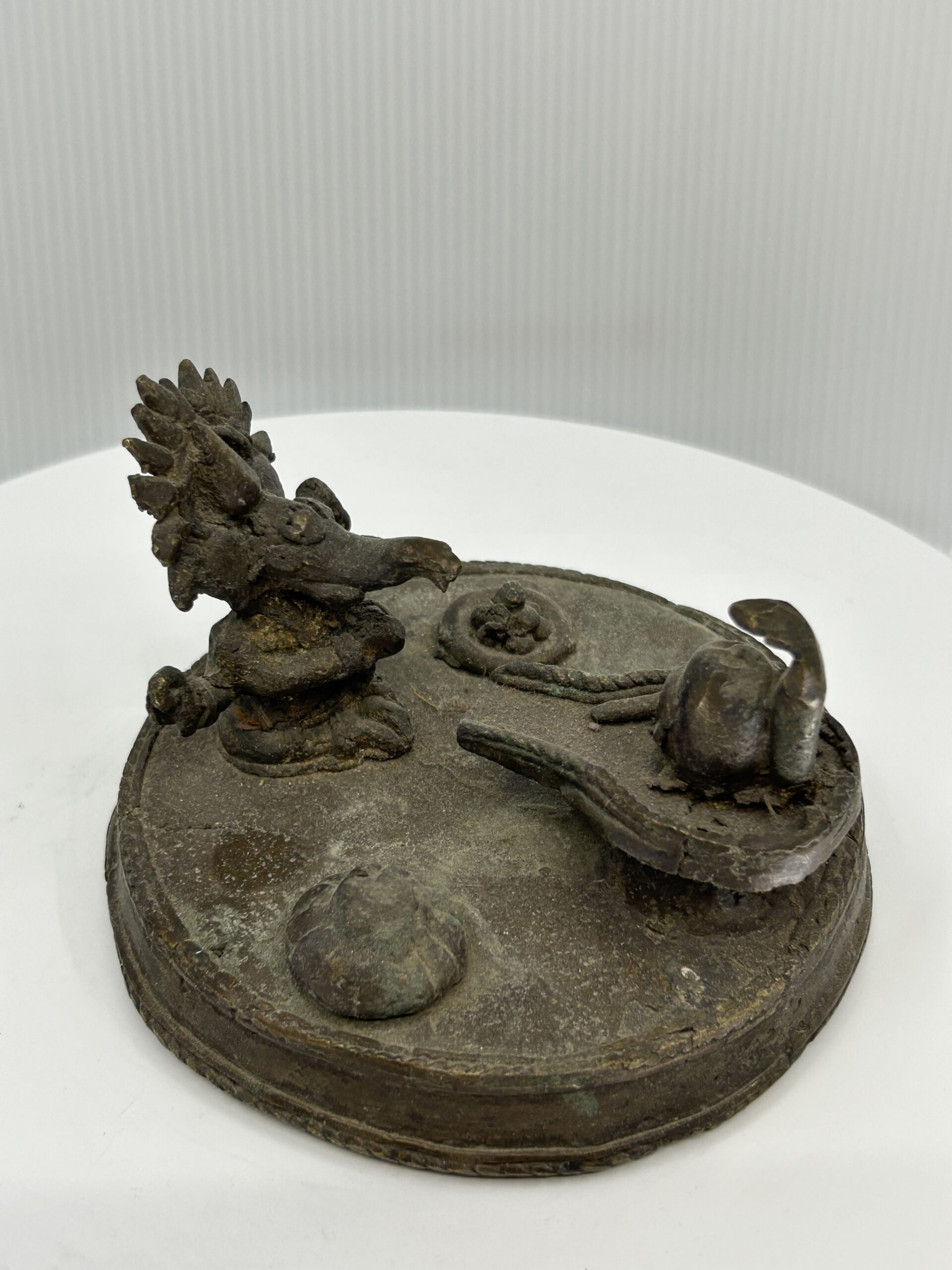 Ganesh and cobra on circular base – Divine Distraction